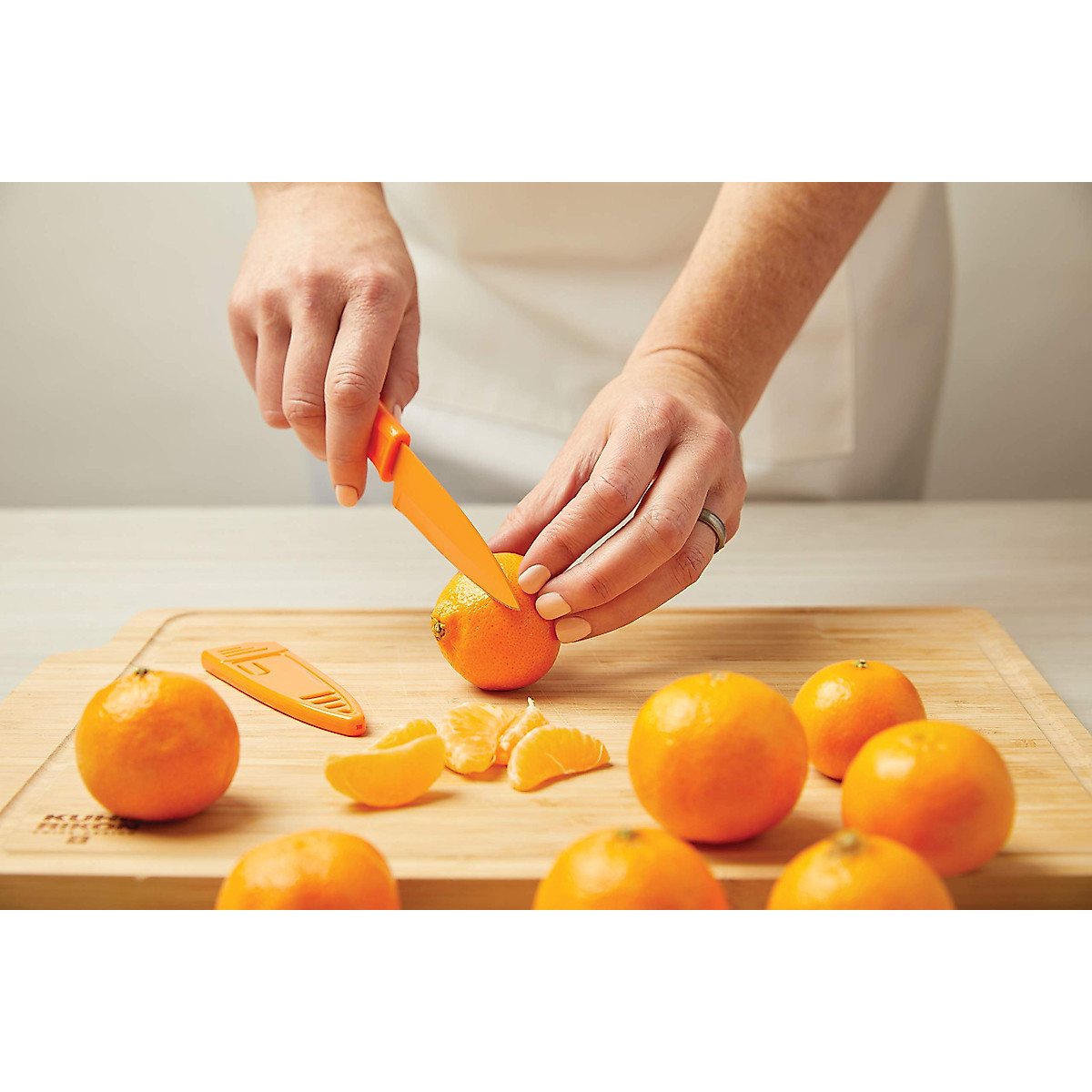 Kuhn Rikon Colori Non-Stick Straight Paring Knife with Safety Sheath, 4 inch/10.16 cm Blade, Tangerine