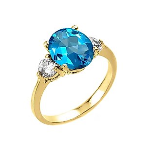Elegant 10k Yellow Gold Oval Shape Blue Topaz with White Topaz 3-Stone Engagement Ring (Size 5.5)