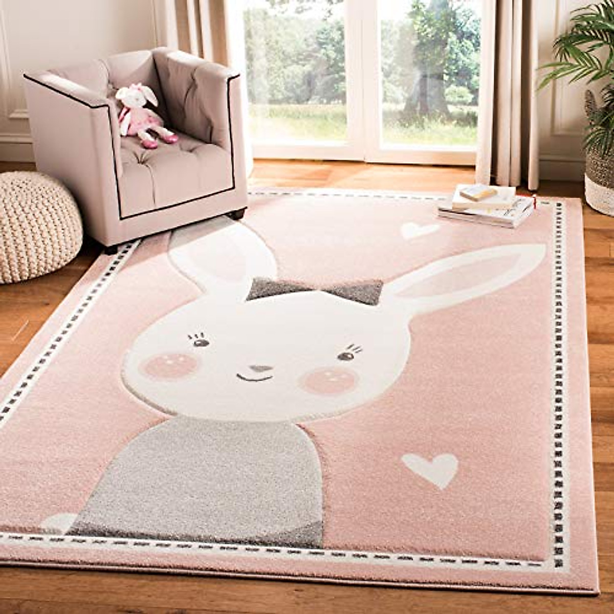 SAFAVIEH Carousel Kids Collection Accent Rug - 3'3" x 5'3", Pink & Ivory, Bunny Design, Non-Shedding & Easy Care, Ideal for High Traffic Areas for Boys & Girls in Playroom, Nursery, Bedroom (CRK166P)