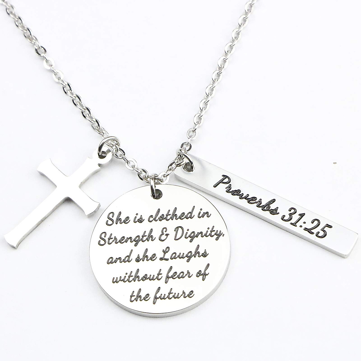 Memgift Christian Necklace Stainless Steel Cross Pendant Jewelry for Women She is Clothed in Strength and Dignity and She Laughs without Fears of the Future