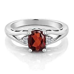 Gem Stone King 925 Sterling Silver Red Garnet and White Topaz 3 Stone Engagement Ring For Women | 1.28 Cttw | Oval 8X6MM | Round 2MM | Gemstone January Birthstone | Size 8
