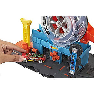 Hot Wheels Toy Car Track Set City Super Twist Tire Shop with 1:64 Scale Car, Single or Multi-Car Play