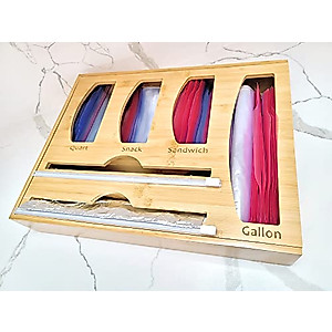 Redesigned and OVERSIZED ZipLock Bag storage organizer with plastic wrap and aluminum foil dispenser with cutter. 4 slots - Quart, Sandwich, Freezer and Gallon size.