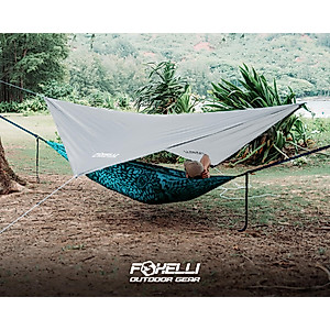 Foxelli Hammock Rain Fly - Waterproof Lightweight Tent & Hammock Rain Tarp for Camping, Backpacking w/Easy Setup Including Extra Long Guy Lines & Stakes