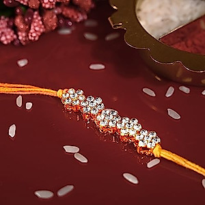 Tarini Gallery Rakhi for Brother Bhai Bhaiya Bhatija Raksha Bandhan gift Rakhi Thread Rakhi with Roli Chawal and Greeting card gift pack(Brass Kalkavati)