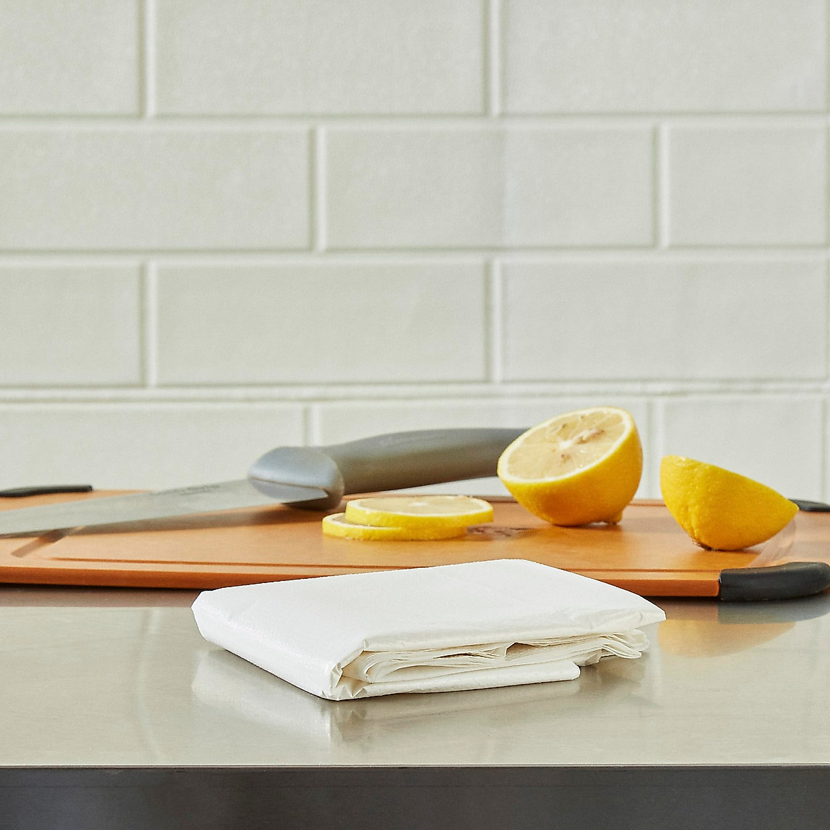 Clean Tek White Plastic Disposable Apron - 42" x 27 1/2" - 100 count box - Restaurantware