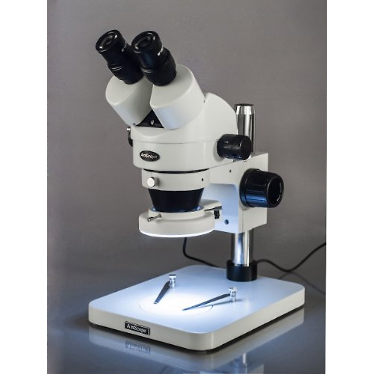 AmScope SM-1BS-144S Professional Binocular Stereo Zoom Microscope, WH10x Eyepieces, 7X-45X Magnification, 0.7X-4.5X Zoom Objective, 144-Bulb LED Ring Light, Pillar Stand, 110V-240V