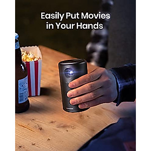 Anker NEBULA Capsule, Smart Wi-Fi Mini Projector, 100 ANSI Lumen Portable Projector, 360° Speaker, Movie Projector, 100 Inch Picture, 4Hr Video Playtime for Inside and Outside, Watch Anywhere