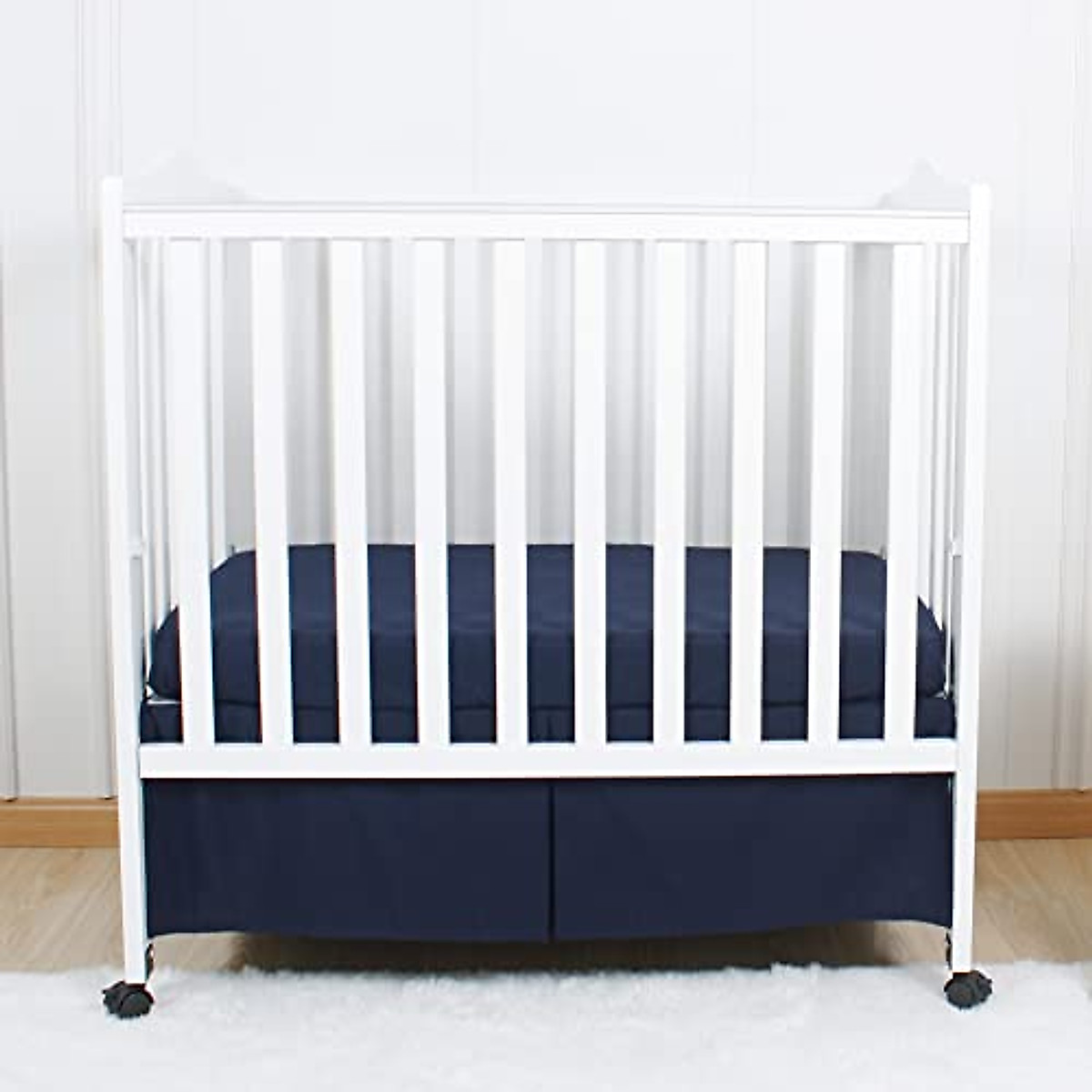 CaSaJa Mini Crib Skirt Pleated, Silk-Looking Soft Microfiber Baby Bed Skirt with Durable Platform for Mini and Portable Cribs 24" X 38", 12" Generous Drop Dust Ruffle, Machine Washable, Navy