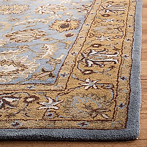 SAFAVIEH Heritage Collection Accent Rug - 2' x 3', Blue & Gold, Handmade Traditional Oriental Wool, Ideal for High Traffic Areas in Entryway, Living Room, Bedroom (HG958A)