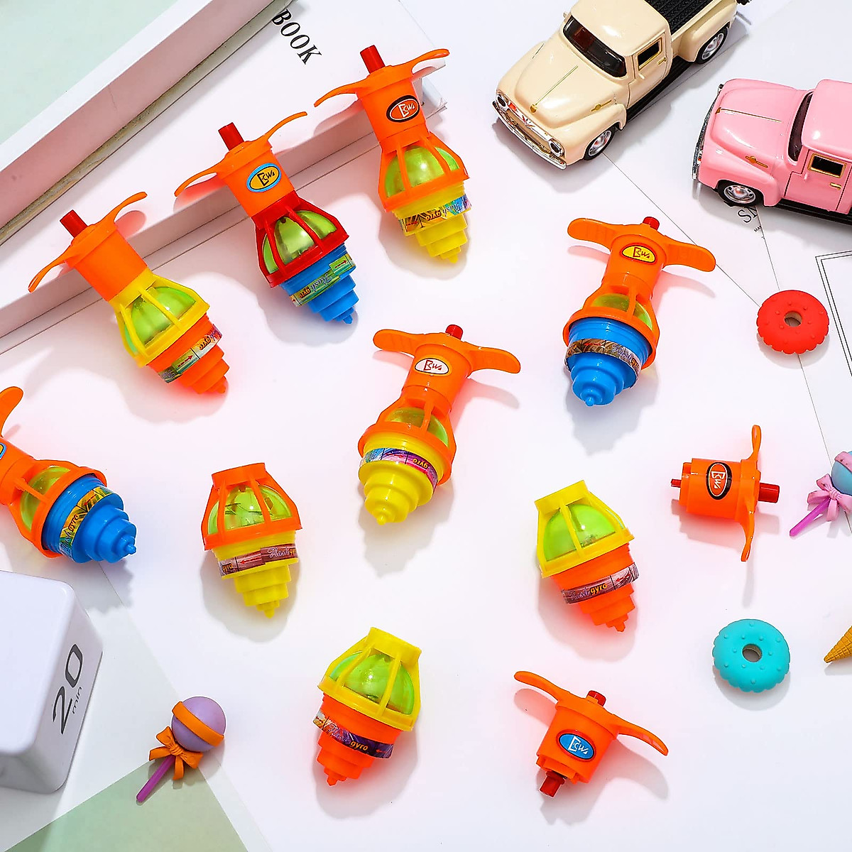 Bulk LED Light Up Spinner Tops Launcher with Gyroscope Motion Colorful Flashing Toys Novelty Bulk Goodie Bag Fillers Gifts Stuffers for Birthday Party Favors (50 Pcs)