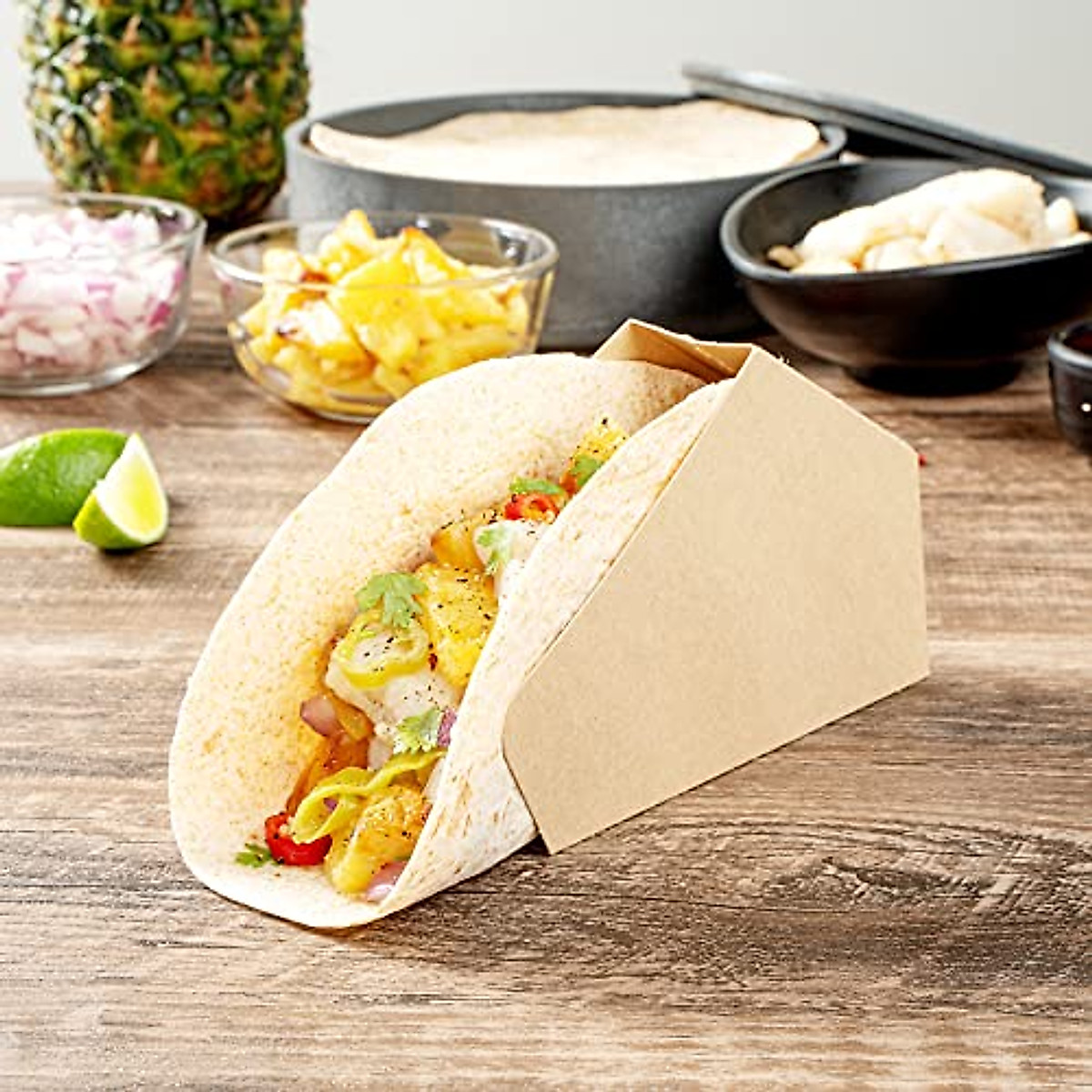 Restaurantware Bio Tek 6 .25 x 2 x 3.75 Inch Single Taco Holder 200 Greaseproof Stand Up Taco Holder - Large Self-Standing Kraft Paper Paper Taco Holder Freezable