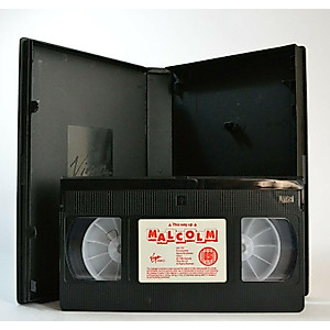 MALCOLM---A CRAZY GENIUS IN A MAD , BAD WORLD