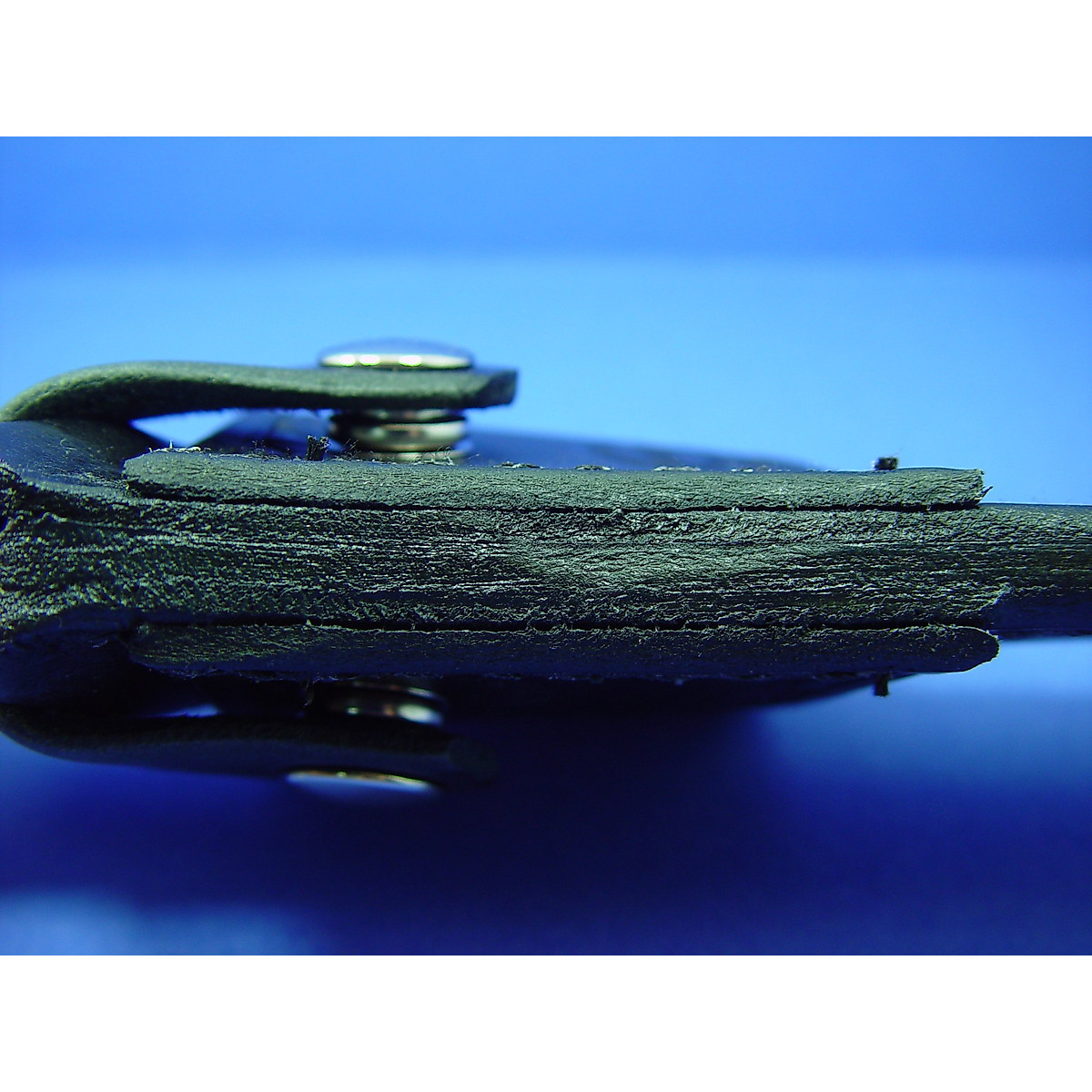 Buck 119 Cross Draw Knife Sheath. This Sheath Is Made Out of 8 Ounce Leather the Leather Is Very Soft Durable and Pliable You Will Not Need to Line Your Sheath for Your Finer Knives. The Leather Is Dyed Black with Border Tooling. The Sheath Can Be Worn on