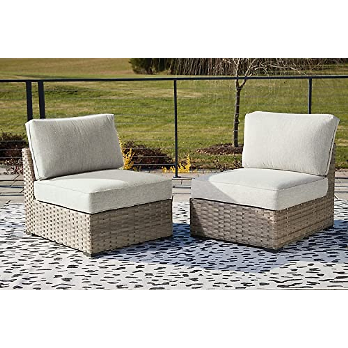 Signature Design by Ashley Outdoor Calworth Resin Wicker Patio Armless Chair, 2 Count, Beige
