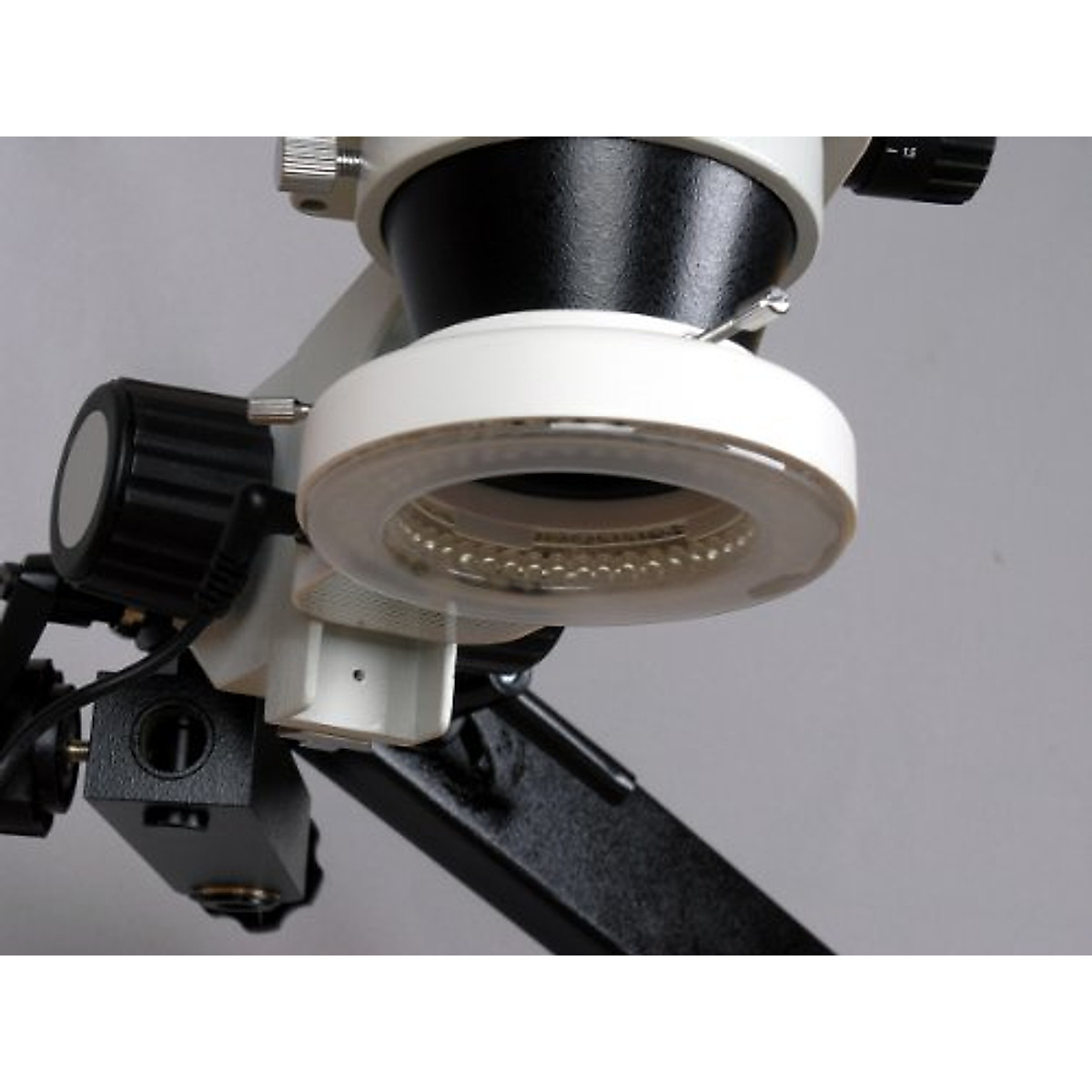 AmScope SM-8TZ-144S Professional Trinocular Stereo Zoom Microscope, WH10x Eyepieces, 3.5X-90X Magnification, 0.7X-4.5X Zoom Objective, 144-Bulb LED Ring Light, Articulating-Arm Boom Stand, 110V-240V, Includes 0.5x and 2.0x Barlow Lenses