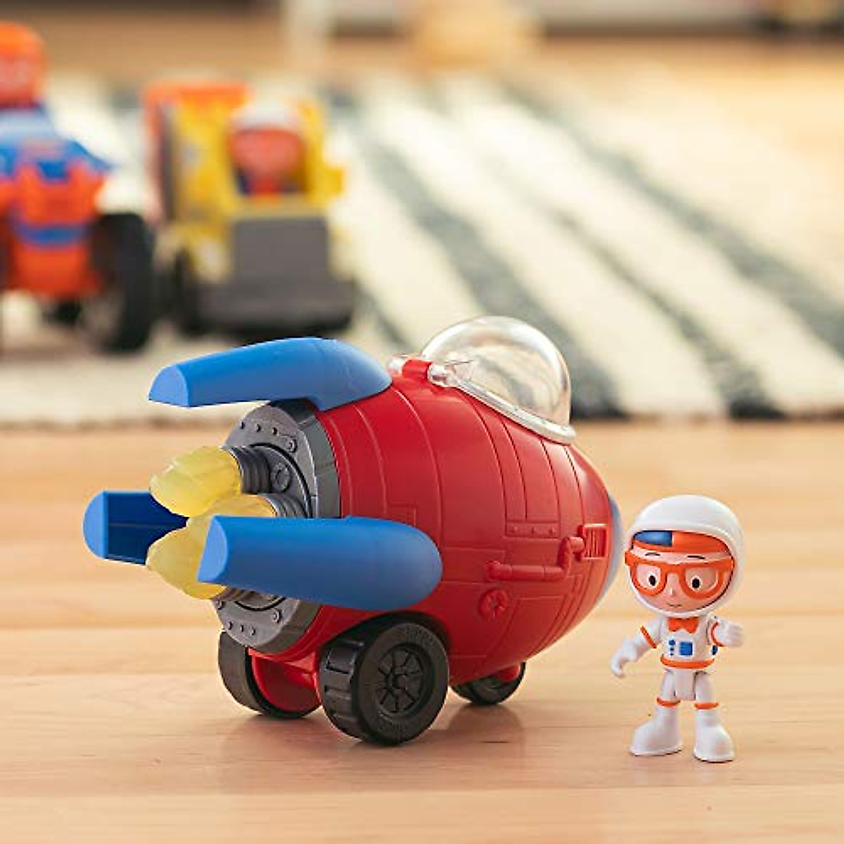 Blippi Rocket Ship - Mini Vehicle with Freewheeling Features Including 2” Classic Character Toy Figure - Imaginative Play for Toddlers, Young Children, Preschoolers