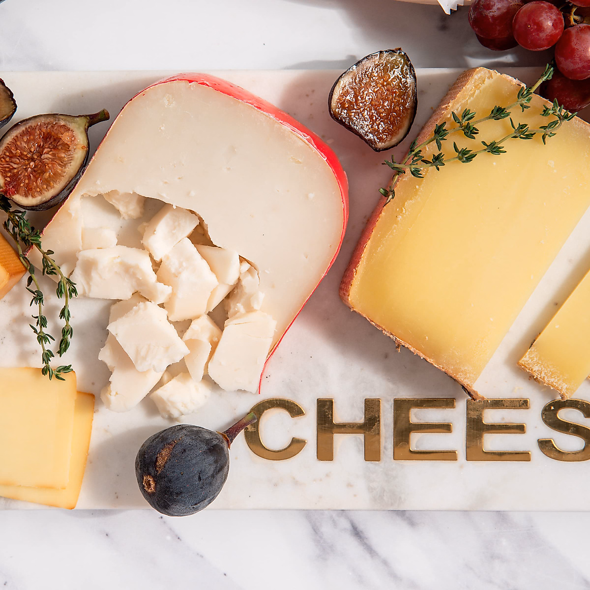 igourmet Cheese Sampler - Our Royal 8-Cheese Assortment contains Blue Cheese, Goat Cheese, Nutty, Smoked, Tangy, Spanish Cheese, Goat Cheese, Creamy, and Swiss