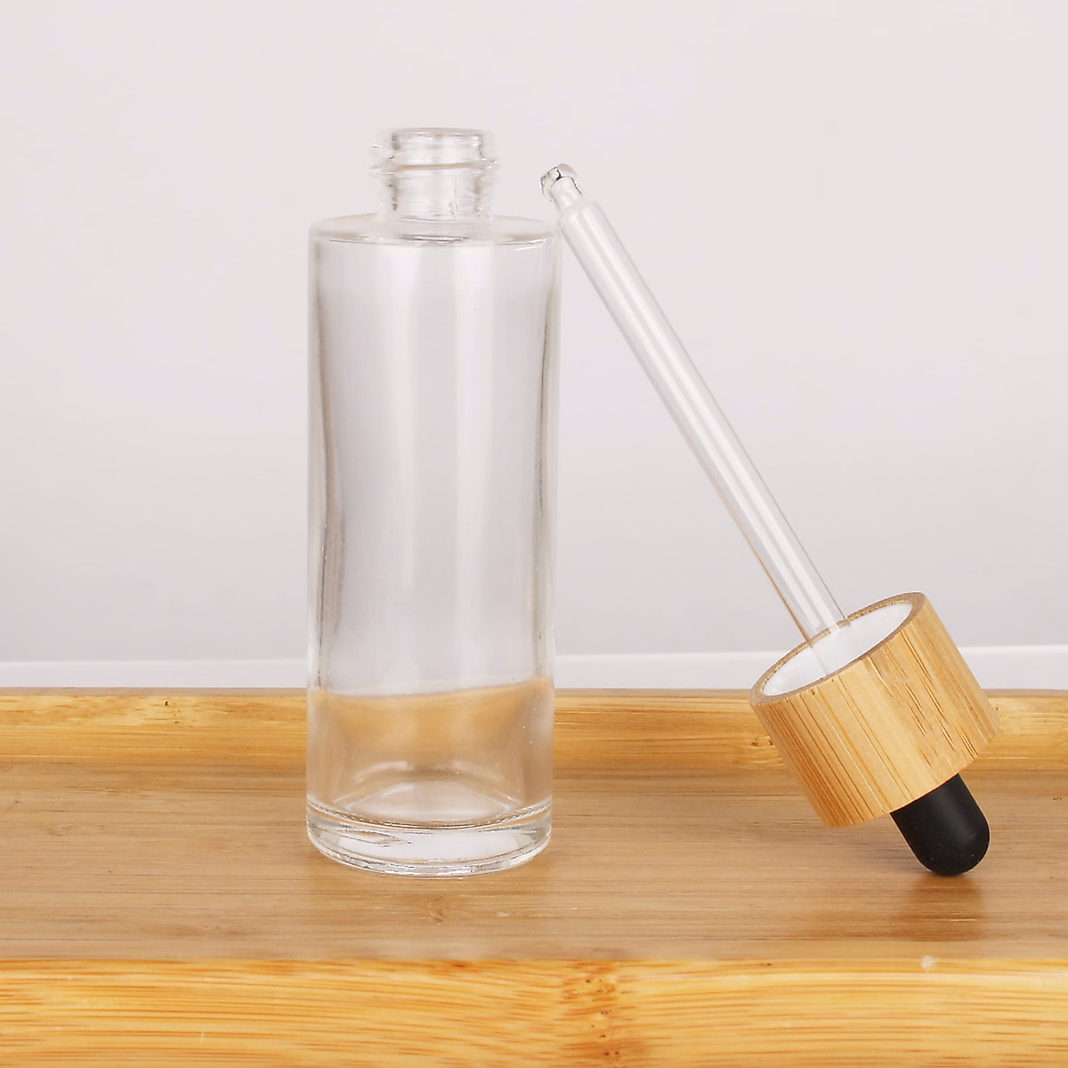 COSIDEA 6 PCS empty 60ml / 2 oz clear glass bottles with wood bamboo dropper lids for serum and essential oil, DIY cosmetics oils containers, travel perfume droppers bottle container