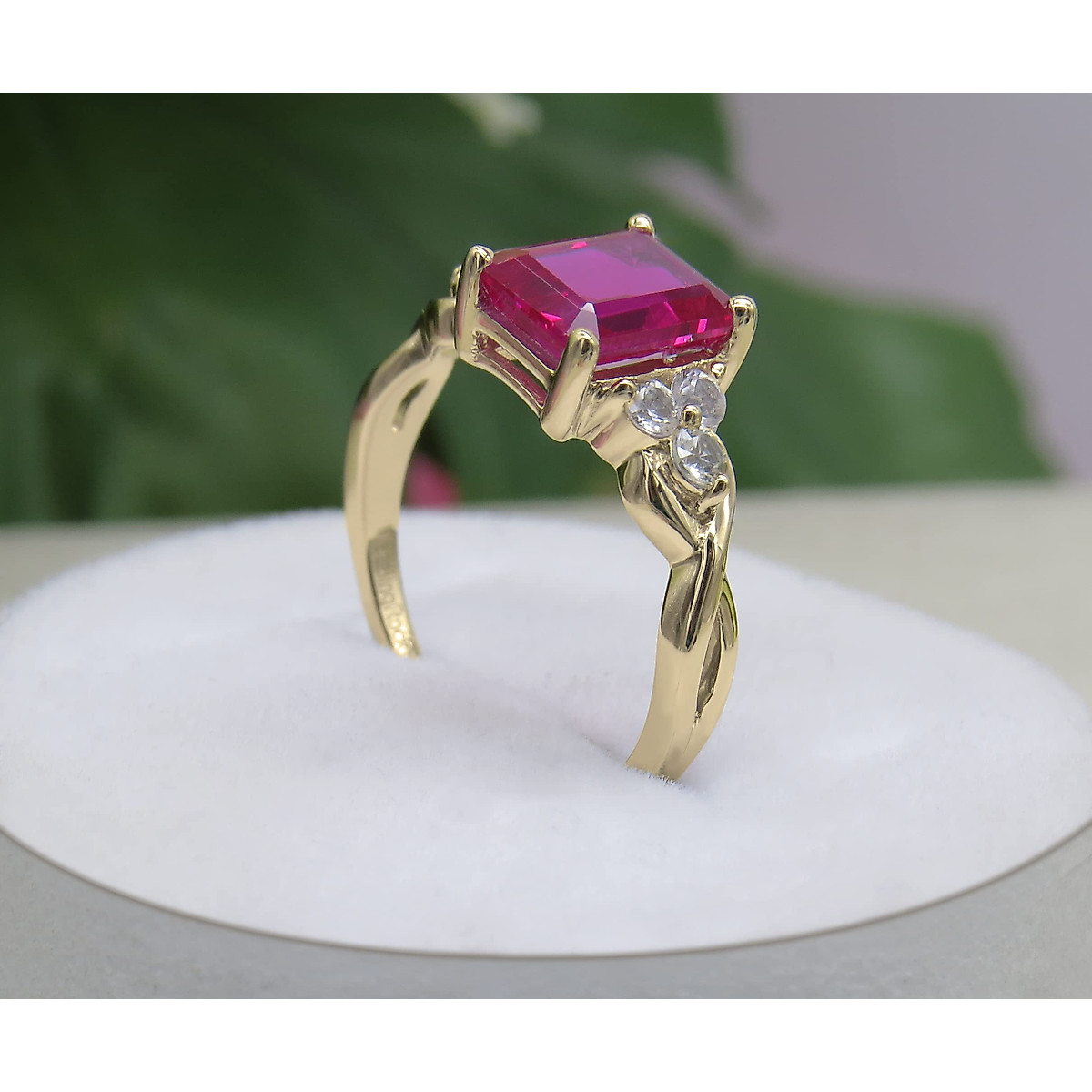 Dazzlingrock Collection 8x6mm Emerald Shape Center Lab Created Ruby & 2.2mm Round White Sapphire on Side Crisscross Shank Engagement Ring for Her in 10K Yellow Gold Size 7