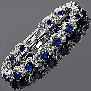 RIZILIA Blossom Round Simulated Blue Sapphire and White Cubic Zirconia 18K White Gold Plated Tennis Bracelet, 7"