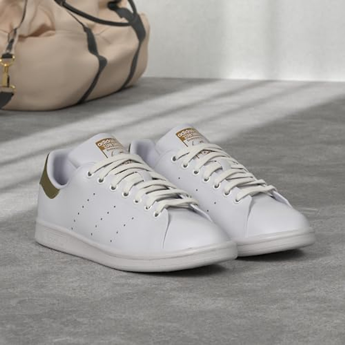 adidas Originals Women's Stan Smith (End Plastic Waste) Sneaker, White/White/Gold Metallic, 6