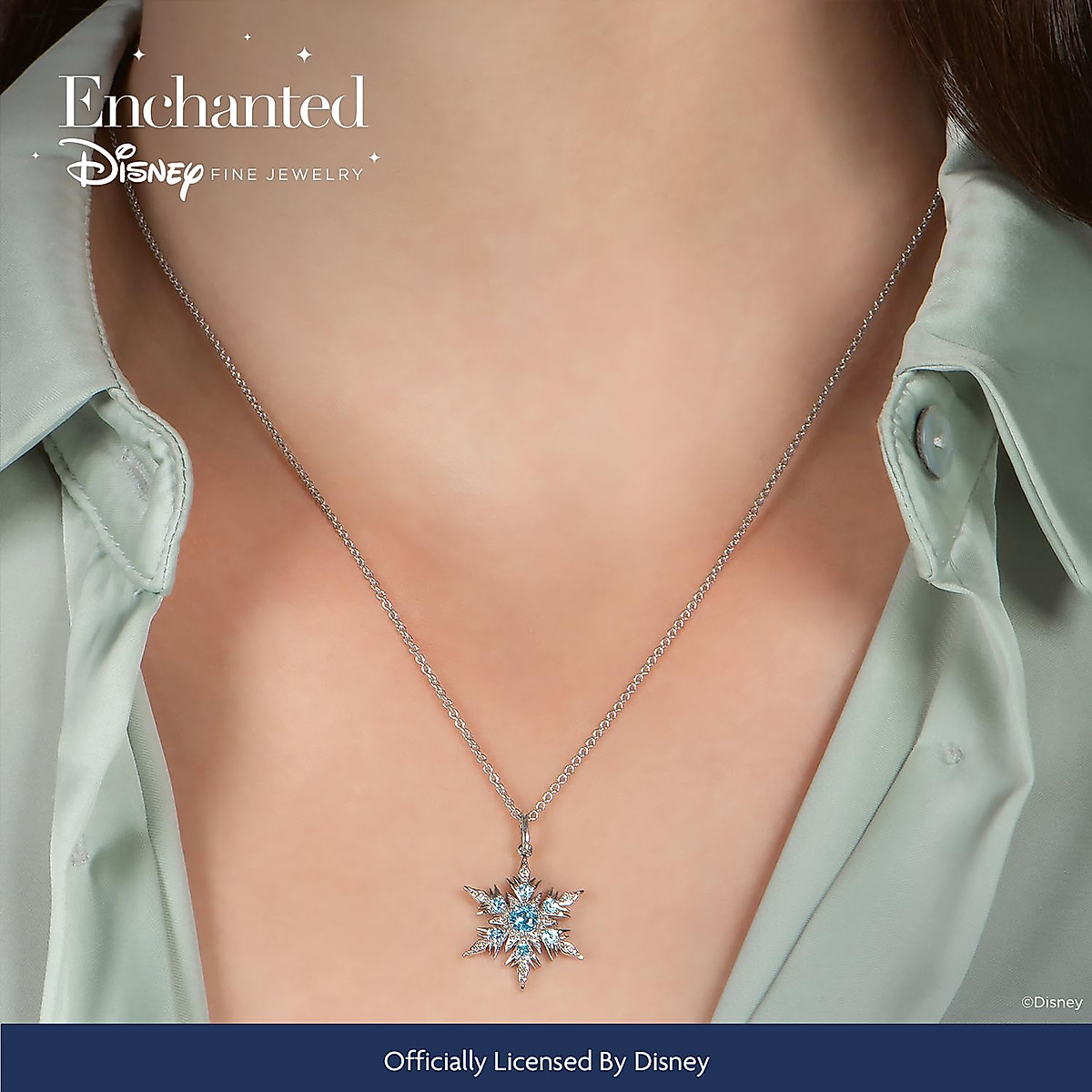 Jewelili Enchanted Disney Fine Jewelry Sterling Silver 1/10 Cttw Diamond and Swiss Blue Topaz Elsa Pendant