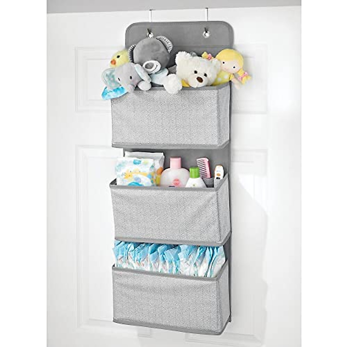 mDesign Fabric Baby Nursery Hanging Organizers for Over The Door Storage for Kids - 3 Pocket Organizer Caddy with Hooks for Clothing, School, Diaper, Toy, and Outfit Storage - Gray Herringbone