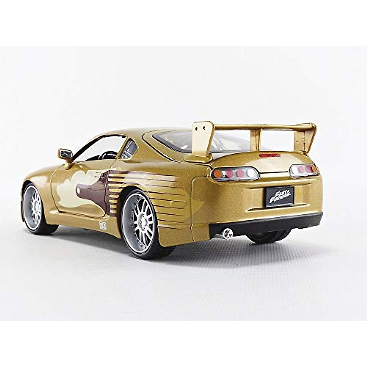 Jada 2 Fast 2 Furious Slap Jack's Toyota Supra Die-Cast Collectible Toy Vehicle Car, Gold with Decals, 1: 24 Scale, Copper