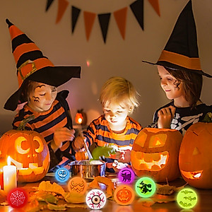 24pcs Halloween Glow in The Dark Bouncing Balls Halloween Theme Designs Bouncy Balls for Halloween Party Supplies（Come with a Pounch Bag）