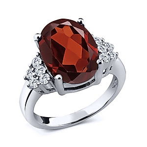 Gem Stone King 925 Sterling Silver Oval Red Garnet and White Moissanite Ring For Women (5.88 Cttw, Gemstone Birthstone, Available In Size 5, 6, 7, 8, 9)
