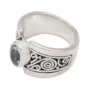 NOVICA Artisan Handmade Blue Topaz Single Stone Ring Artisan Crafted Sterling Silver Wide with Indonesia Serenity Birthstone [crownbezel 0.4 in L x 0.3 in W x 0.2 in H Band Width 7 mm W] ' Blue
