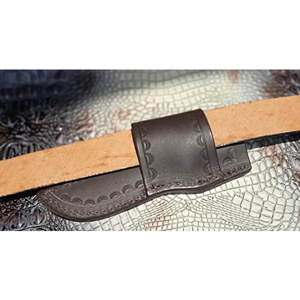 Custom Cross Draw Knife Sheath for Buck 102 Knife. The Sheath Is Made Out of 10 Ounce Water Buffalo Hide Leather the Leather Is Soft Pliable and Very Durable. This Sheath Can Be Worn on the Right or Left Hand Side. It Is Died Dark Brown with Border Toolin