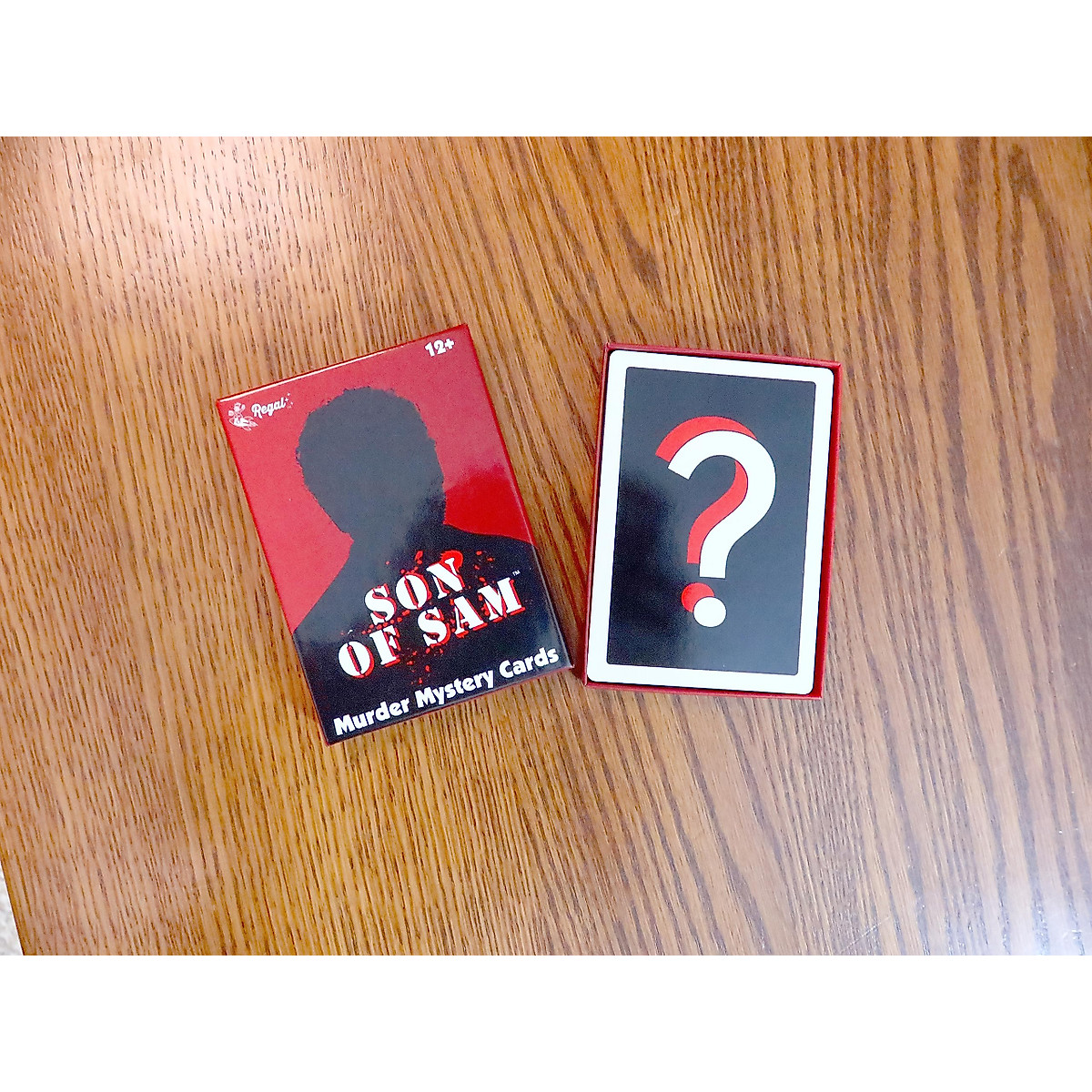 Regal Games - Son of Sam - Murder Mystery Card Game - for Holidays, Game Nights, and Parties - 5”x 2” Card Size - 54 Count - Up to 26 Players, Ages 12+