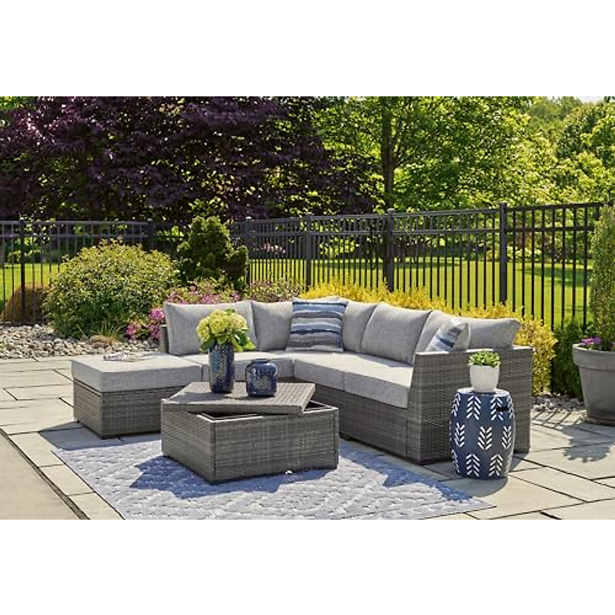 Signature Design by Ashley Petal Road Casual Weather Resistant Cushioned Outdoor Loveseat Sectional/Ottoman/Table Set with 2 Throw Pillows, Set of 4, Gray