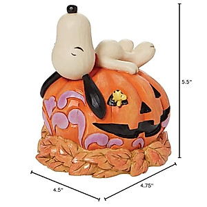 Enesco Peanuts by Jim Shore Halloween Snoopy Laying on Carved Pumpkin Figurine, 5.5 Inch, Multicolor