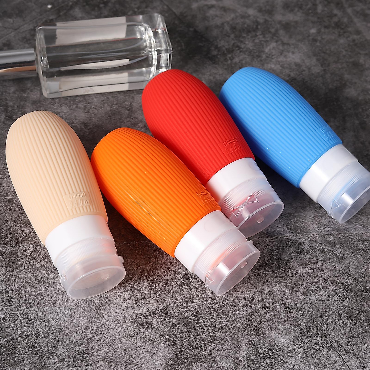 DEPOZA 3.4oz TSA-Approved Squeezable Silicone Travel Bottles - Leak-Proof, BPA-Free Containers for Shampoo, Conditioner, Lotion (4-Pack/Colorful)