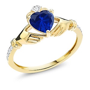 Gem Stone King 10K Yellow Gold Irish Celtic Claddagh Blue Created Sapphire and Diamond Accent Women Ring (0.86 Cttw, Available In Size 5, 6, 7, 8, 9)