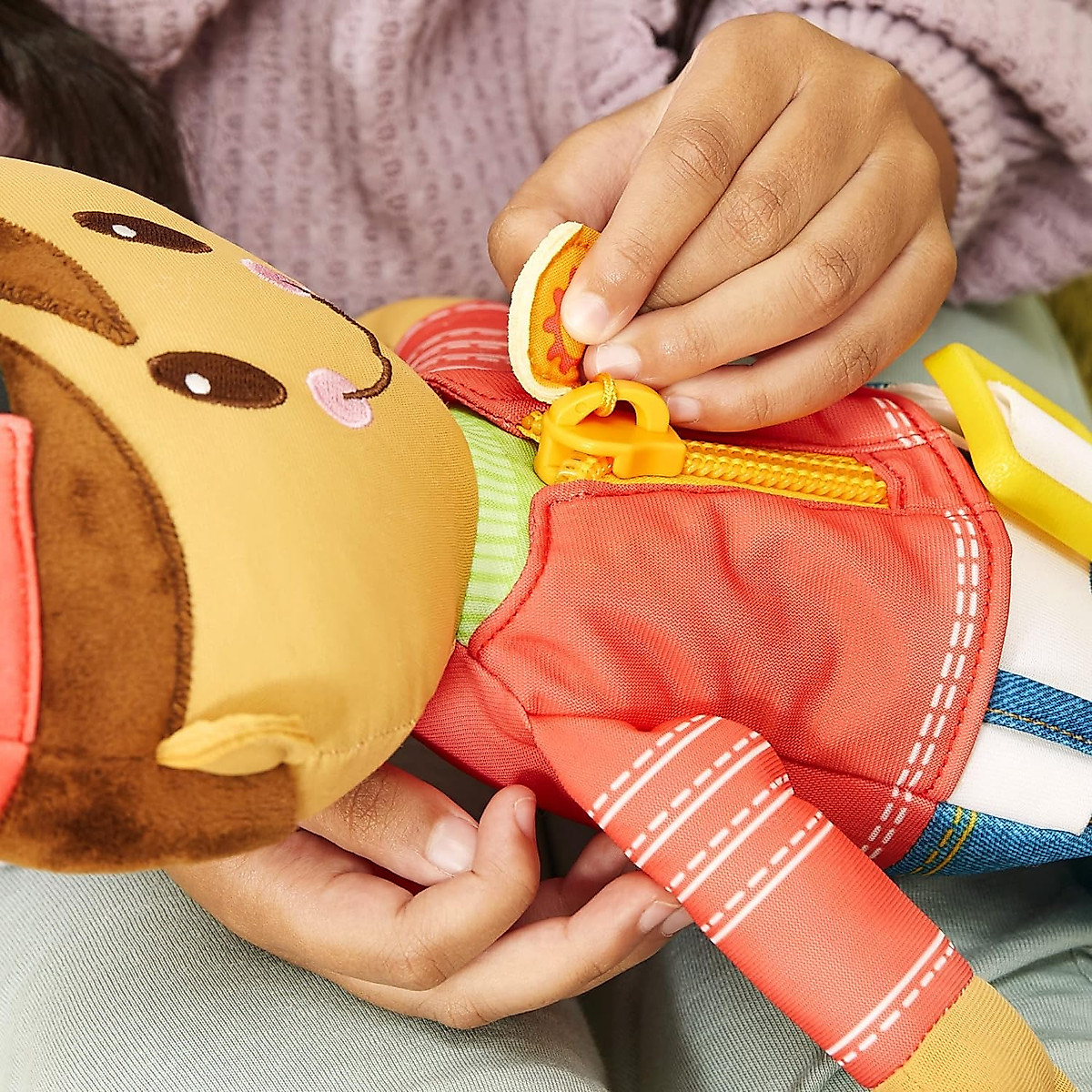 Playskool Dressy Kids Doll with Brown Hair and Hat, Activity Plush Toy with Zipper, Shoelace, Button, for Ages 2 and Up (Amazon Exclusive)