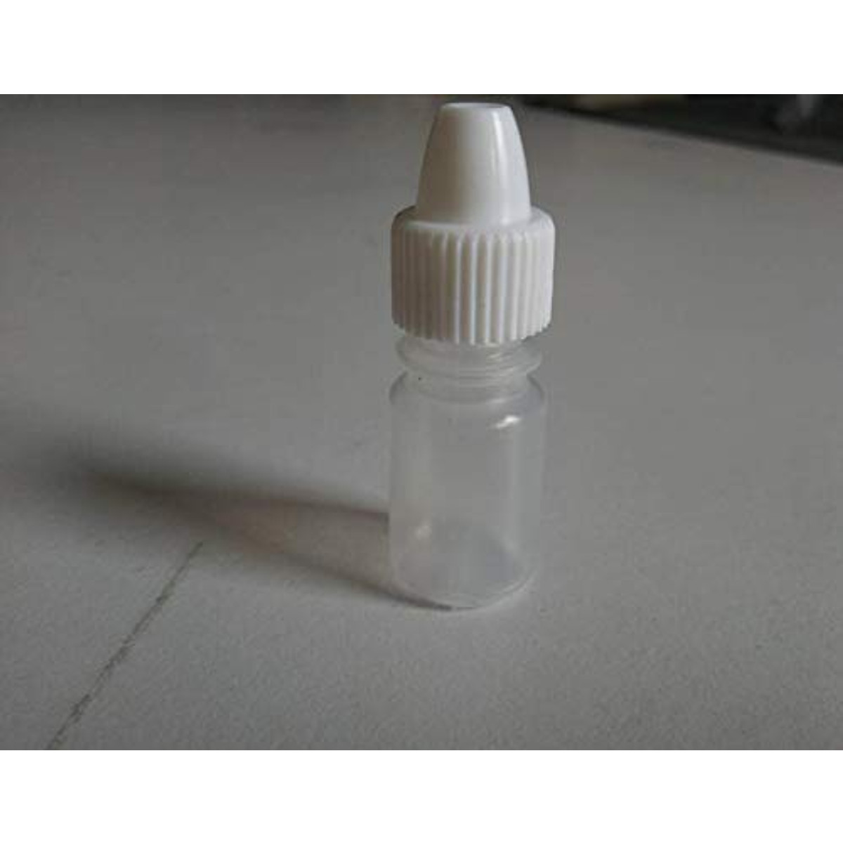 50 Pcs Empty Plastic Squeezable Dropper Bottle with Plug Refillable Portable Eye Liquid Container with Screw Cap (2 ml) by ASTRQLE