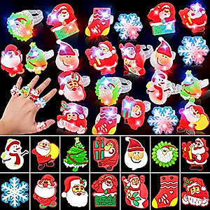 TURNMEON 50 Pack LED Light Up Ring Christmas Party Favors Stocking Stuffers for Kids Flashing Glow in The Dark Funny Christmas Party Supplies Toy Gift Boys Girls Christmas Party Favors Decorations