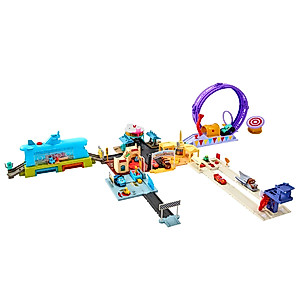Disney and Pixar Cars On The Road Dinoco Rusteze Racing Center Playset with Lightning McQueen Toy Car, Launcher, Short Track and Spinning Pitty, Toy Gift for Kids, HGV69