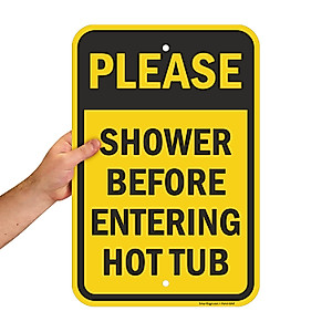 SmartSign 18 x 12 inch “Please Shower Before Entering Hot Tub” Sign with Pre-Cleared Holes, Digitally Printed, 55 mil HDPE Plastic, Black and Yellow, Made in USA