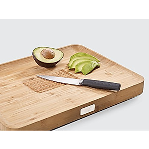 Joseph Joseph Cut & Carve Bamboo Cutting Board with Food Grip and Angled Surface Yellow Large