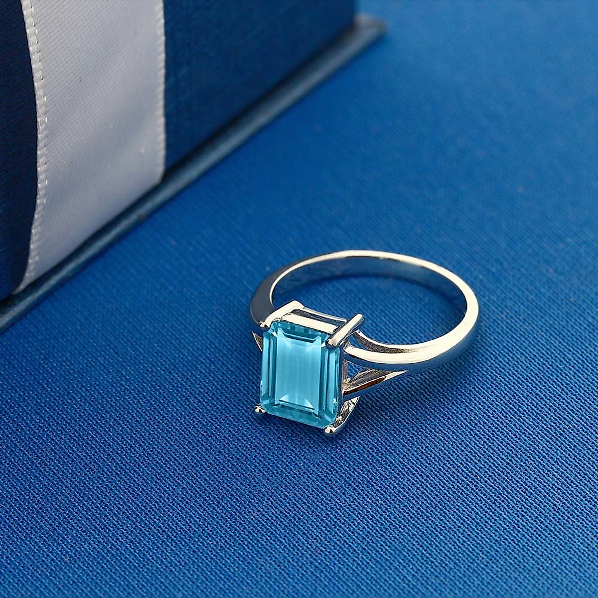 Gem Stone King 925 Sterling Silver Swiss Blue Topaz Solitaire Engagement Ring For Women (3.20 Cttw, Emerald Cut 9X7MM, Gemstone November Birthstone, Available in Size 5,6,7,8,9)