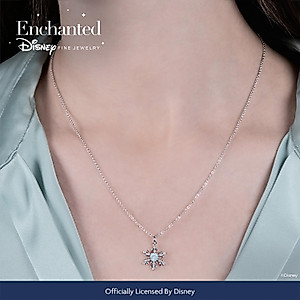 Jewelili Enchanted Disney Fine Jewelry Sterling Silver with 1/8 Cttw Diamonds and Blue Topaz Elsa Snowflake Pendant