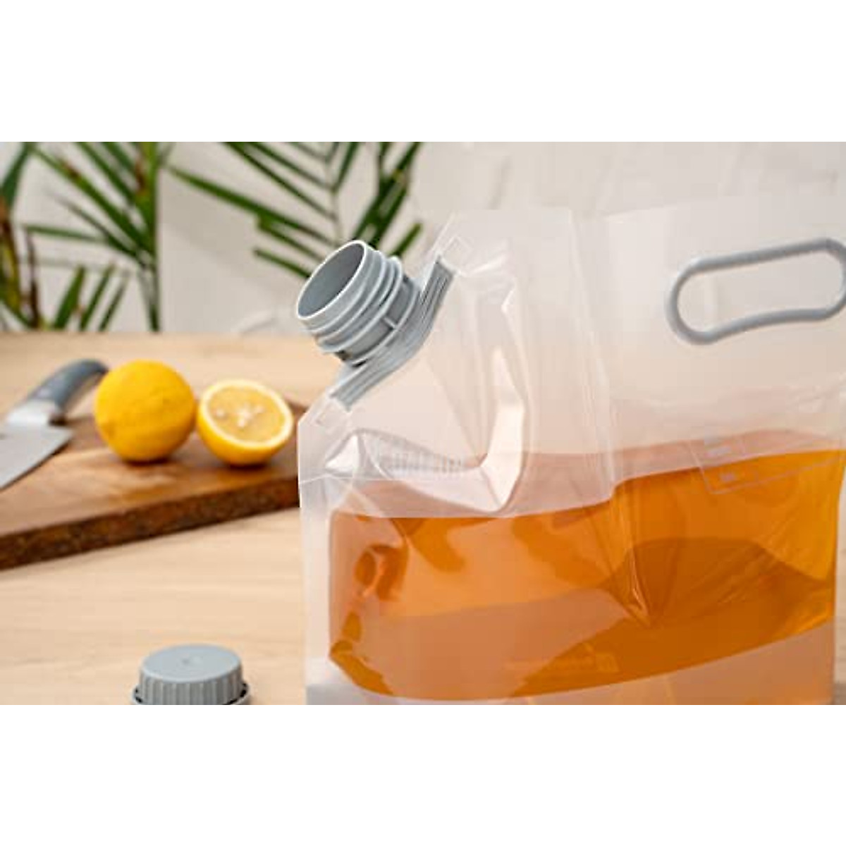 Restaurantware Cater Tek 1/2 Gallon Water Containers 10 Drink Bags - Collapsible Includes Tamper-Evident Caps Clear Plastic Beverage Bags For Catered Events Camping or Hiking Durable Handle