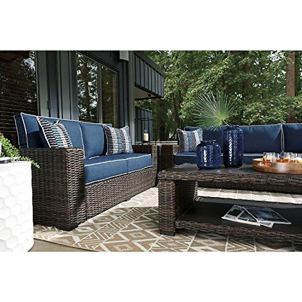 Signature Design by Ashley Grasson Lane Outdoor Patio Wicker Sofa with Cushion and 2 Pillows, Brown & Blue