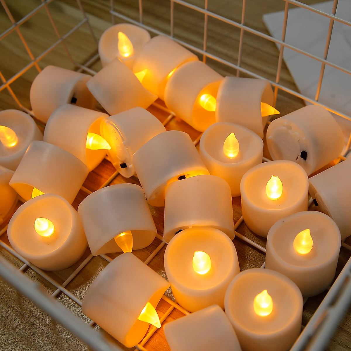 24Pack Flickering Battery Operated LED Tealight Candles, Realistic Electric Fake Candle for Wedding, Table, Gift, for Table Centerpieces, Mood Lighting and Home Decor, Outdoor (Battery Included)