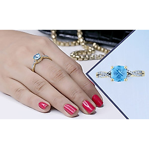 Dazzlingrock Collection 7MM Cushion Blue Topaz & Round White Diamond Swirl Crisscross Split Shank Engagement Ring for Women | 14K Yellow Gold, Size 7.5